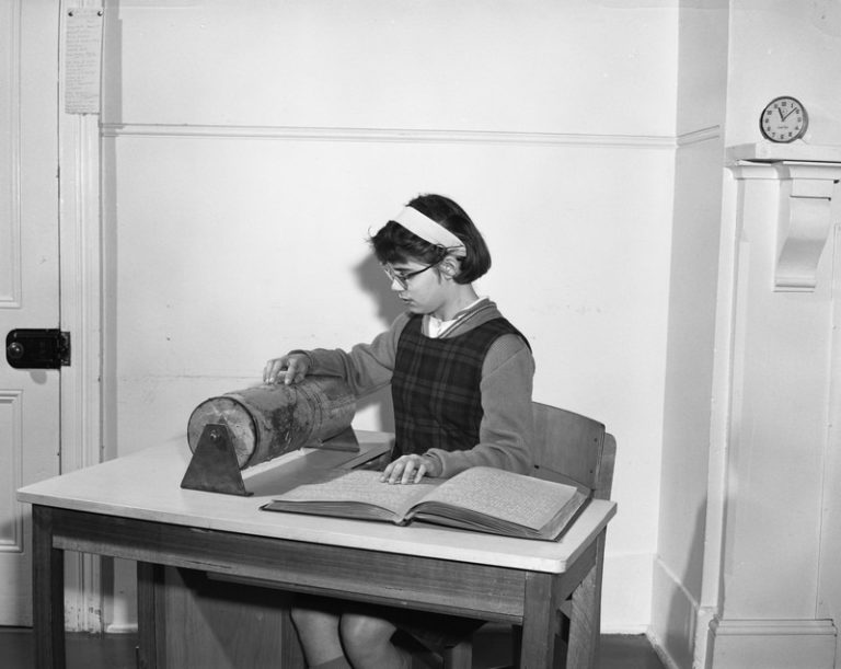 Blind & Deaf Institute, visually-impaired girl reading Braille text ...