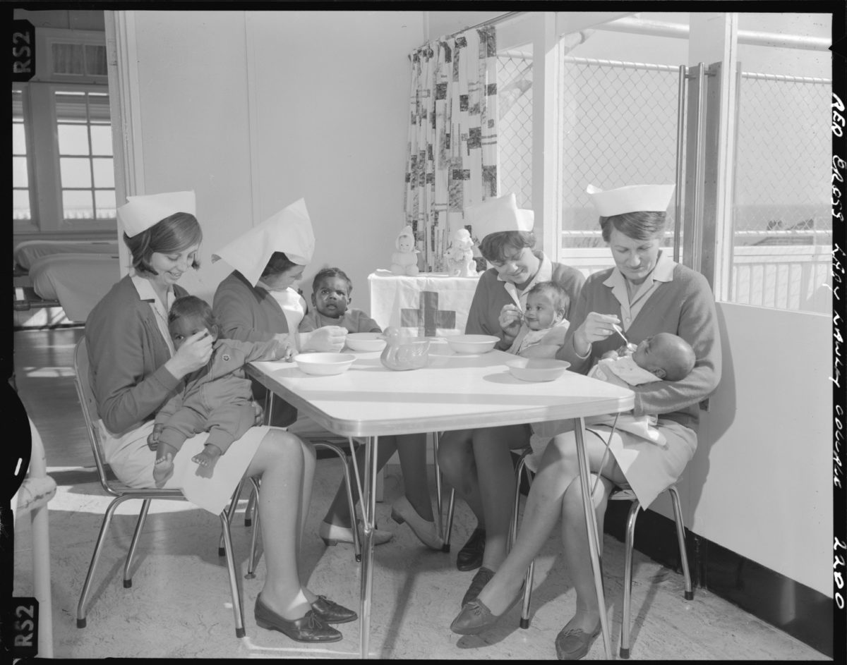 Nurses feeding babies [Lady Lawley Cottage] | Find and Connect